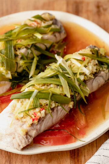 Steamed Fish with Ginger and Spring Onions - Eatnik
